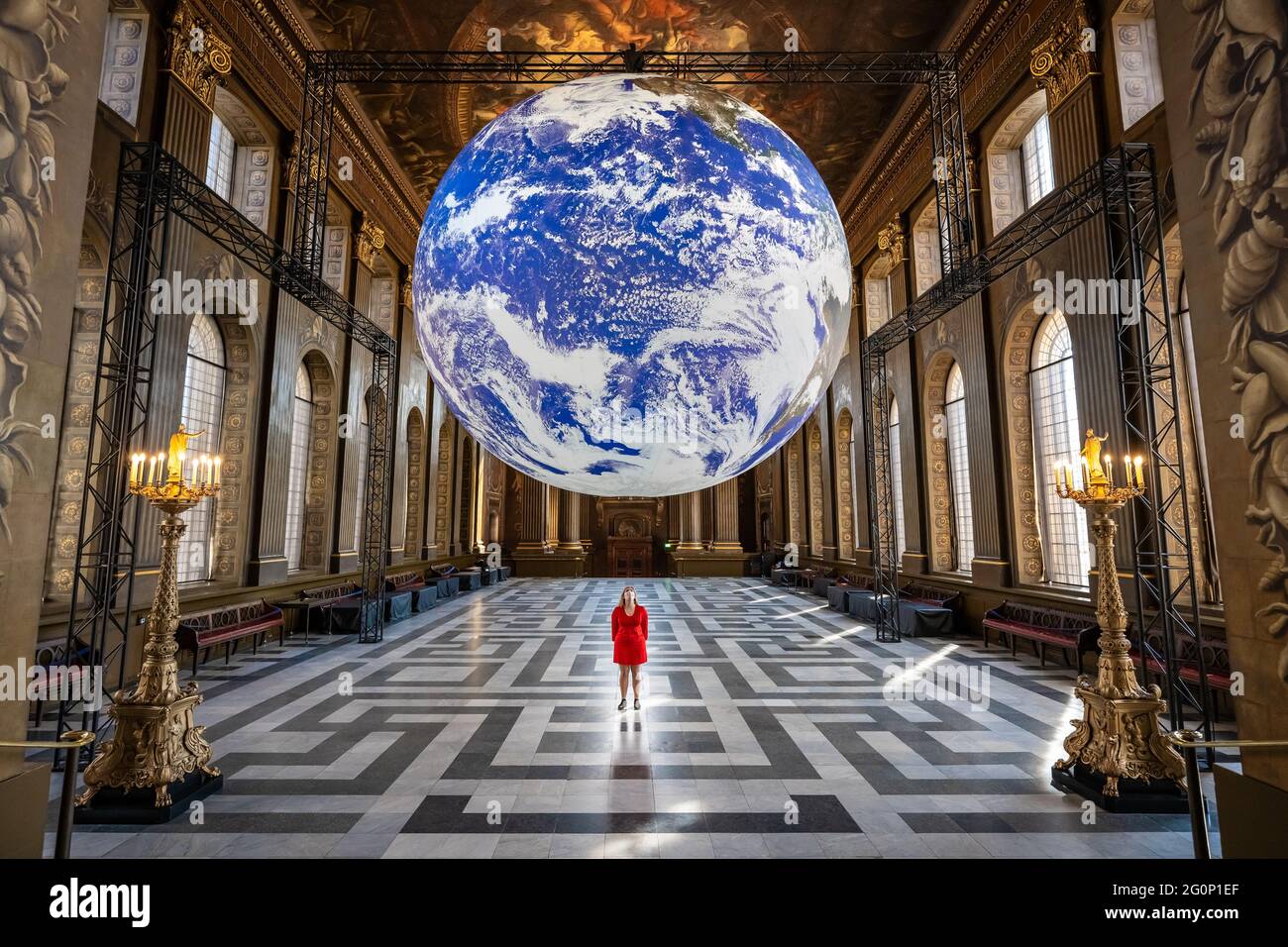 Gaia, a 7m-wide rotating replica earth installation by Luke Jerram on ...