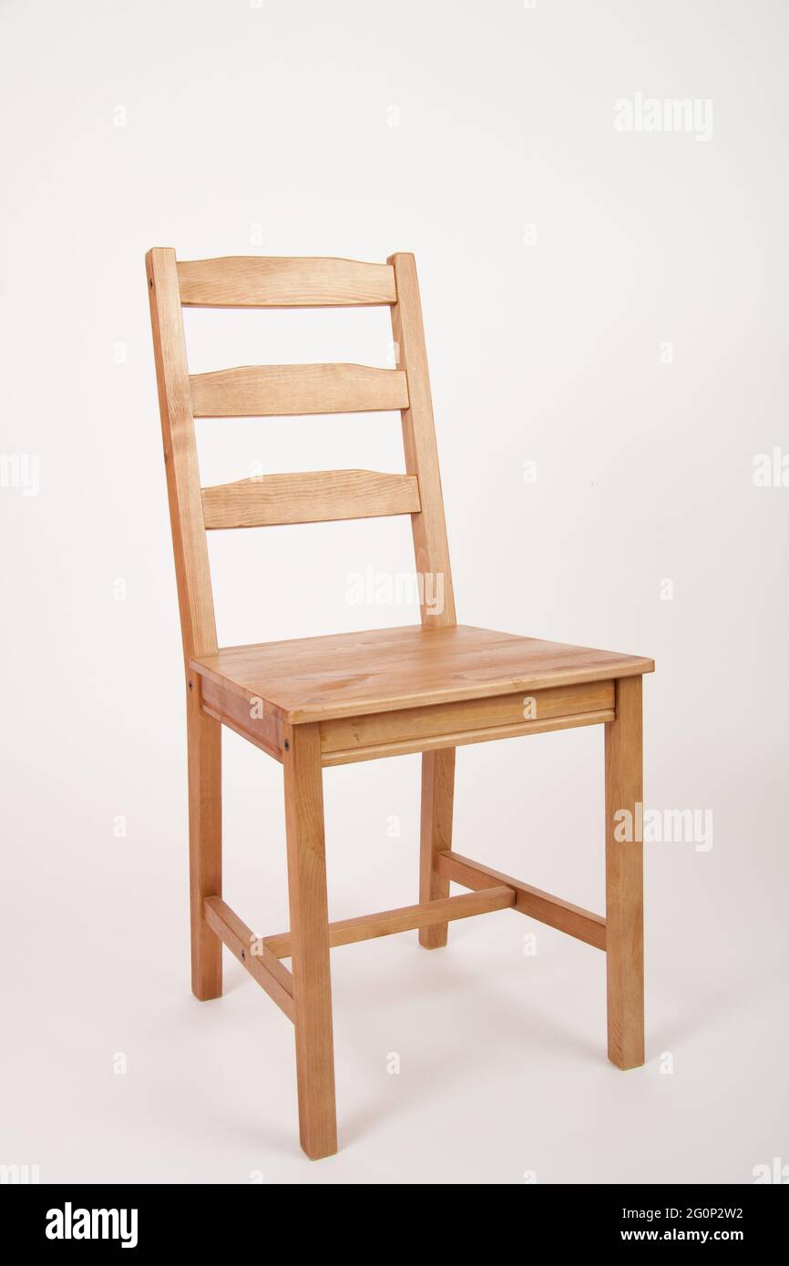 Vertical shot of a wooden chair on a white background Stock Photo - Alamy