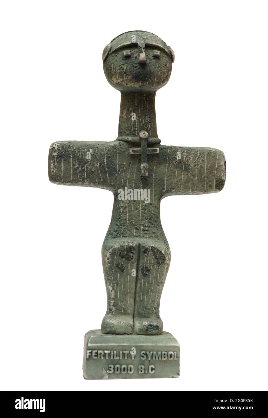 Vertical shot of the Idol of Pomos against a white background Stock ...