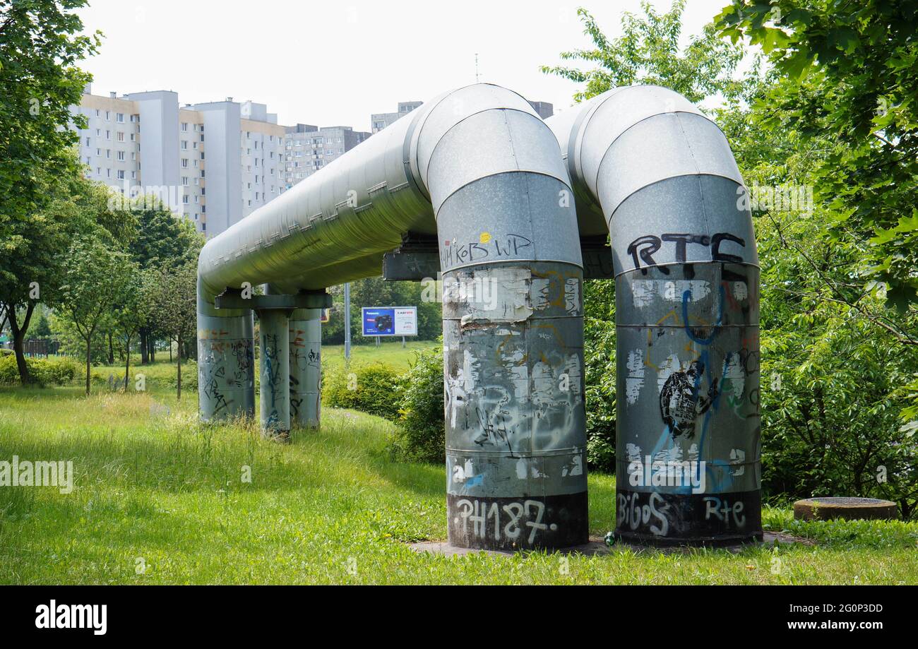 Large pipes on green grass Stock Photo - Alamy