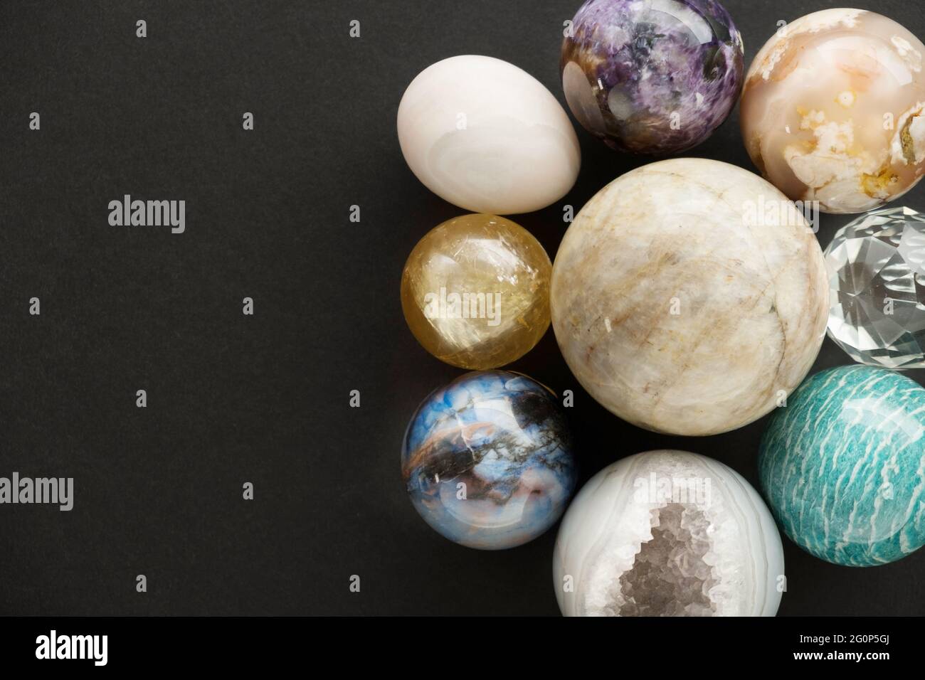 Crystal stone set on black background with space for your copy ...