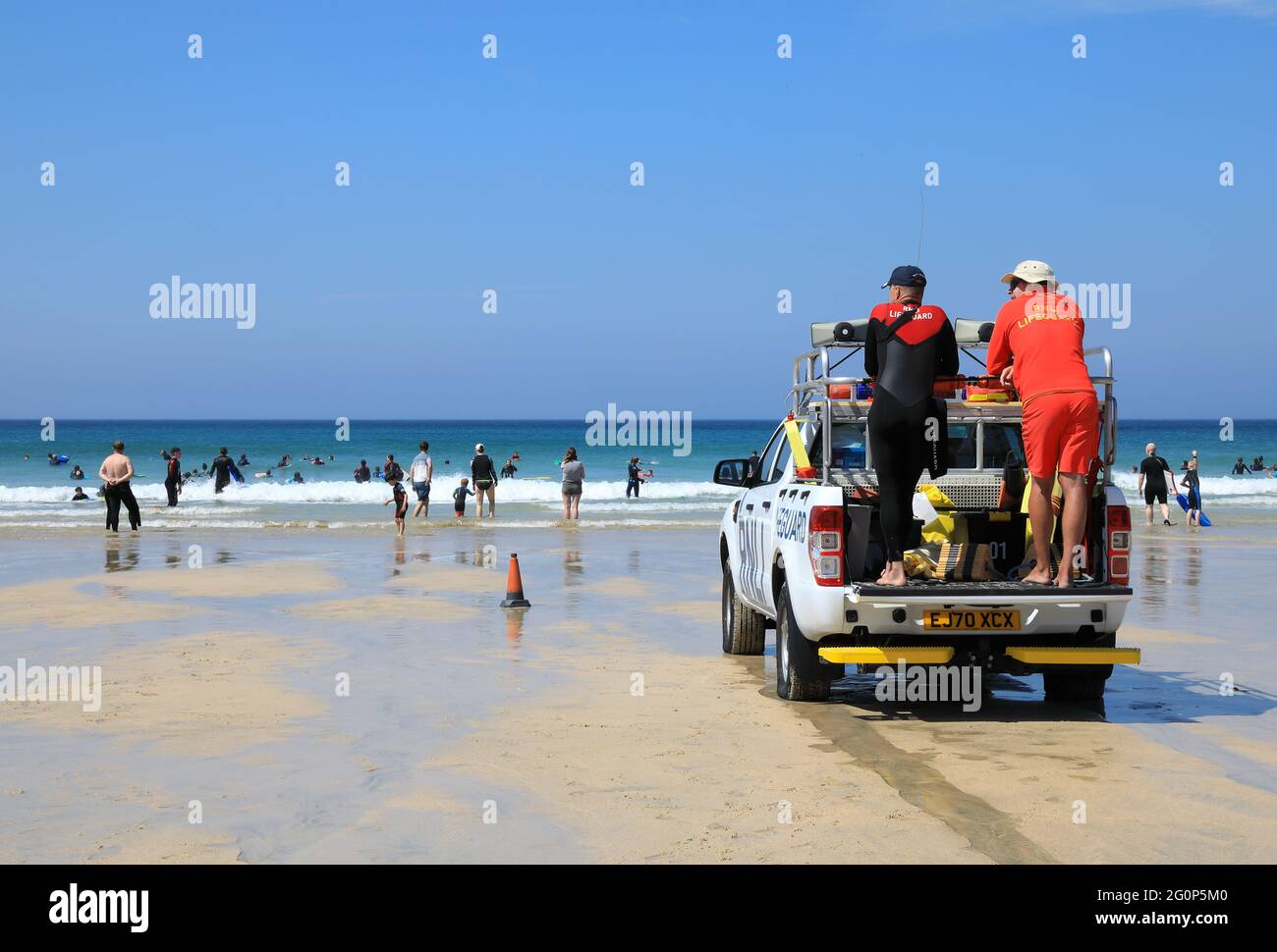 Life guards on safe and sandy Porthmeor beach, popular with surfers and ...