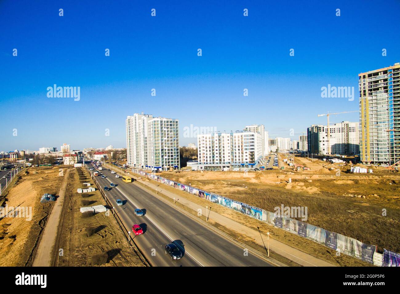 Aerial view at junctions of city highway. Vehicles drive on roads ...