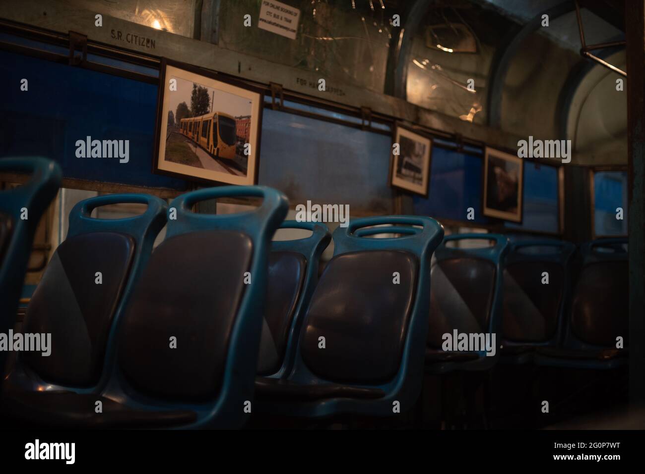Interior of an old vintage bus with photos on the walls Stock Photo - Alamy