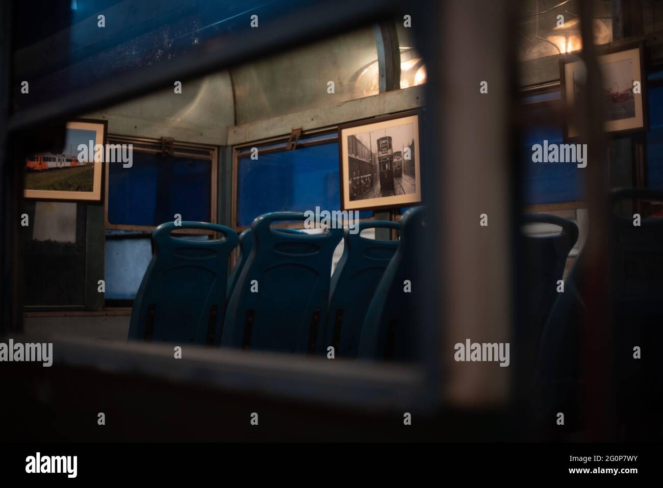 Interior of an old vintage bus with photos on the walls Stock Photo - Alamy