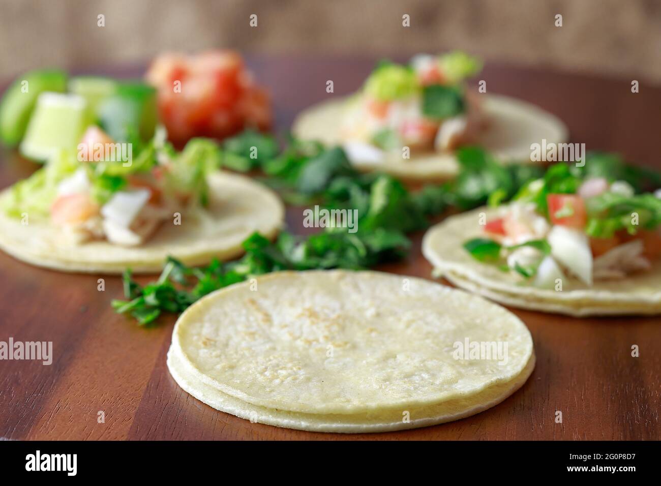 An empty tortilla shell waits for for the ingredients to make a ...