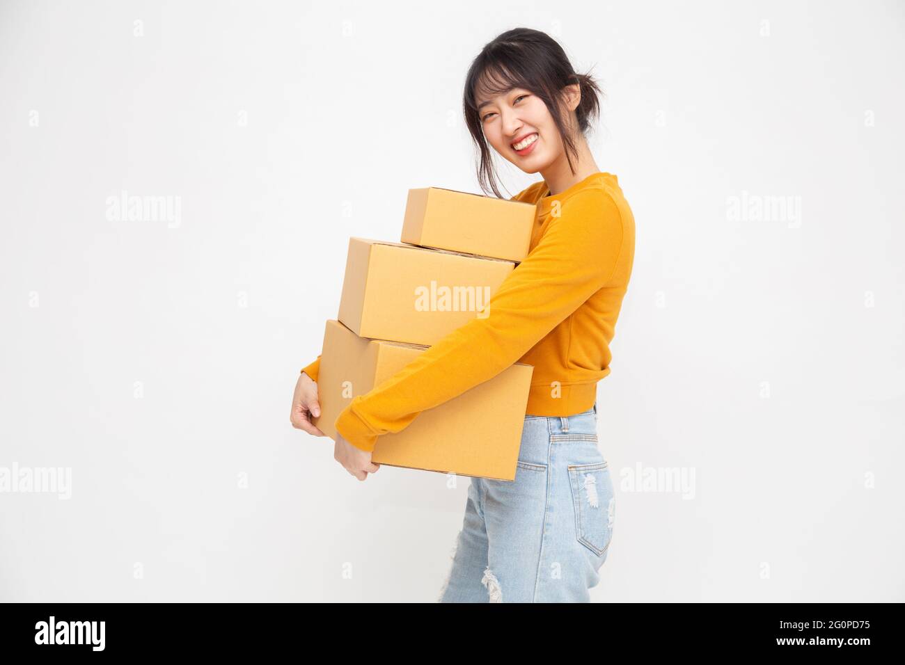 Happy Chinese Asian woman holding package parcel box, Delivery courier ...