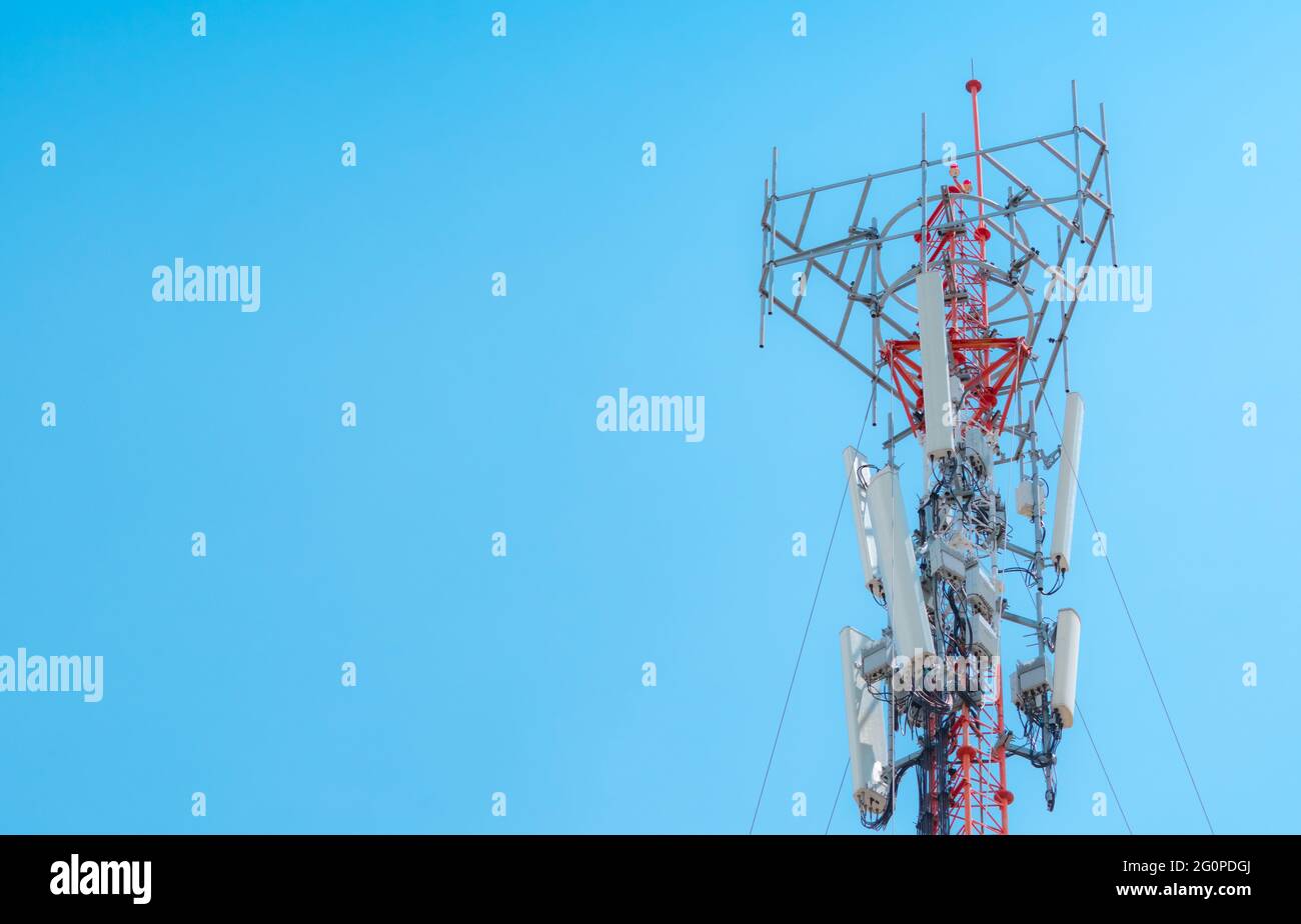 Telecommunication tower. Antenna on blue sky. Radio and satellite pole ...