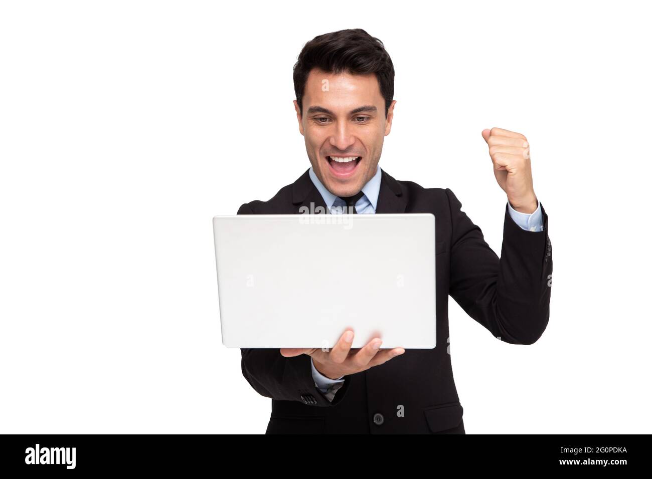 Portrait of an excited Businessman holding laptop computer and ...