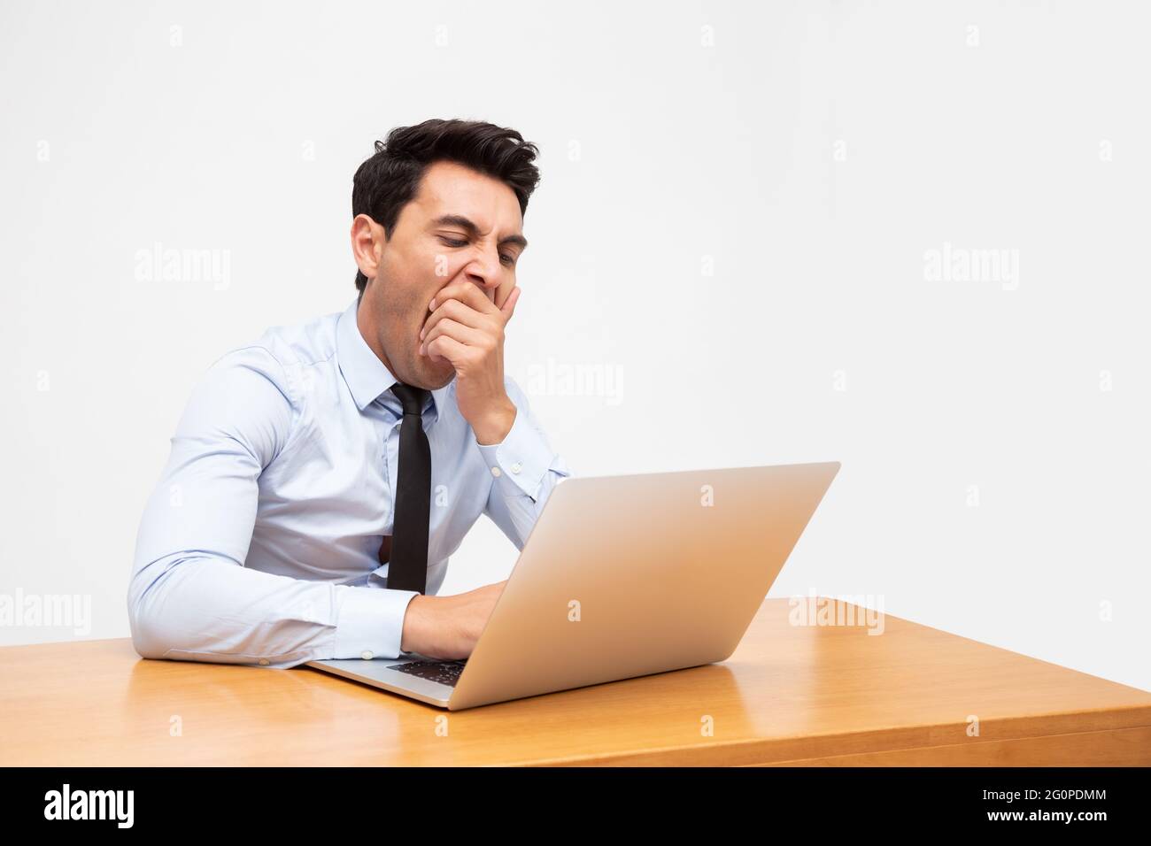 Tired businessman exhausted and yawn after hard work and excessive ...