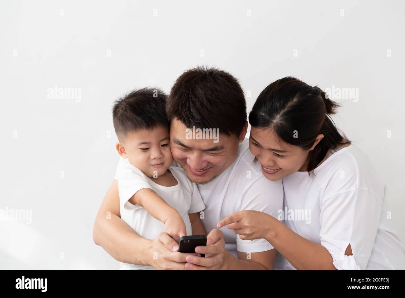Children playing video games parents hi-res stock photography and ...