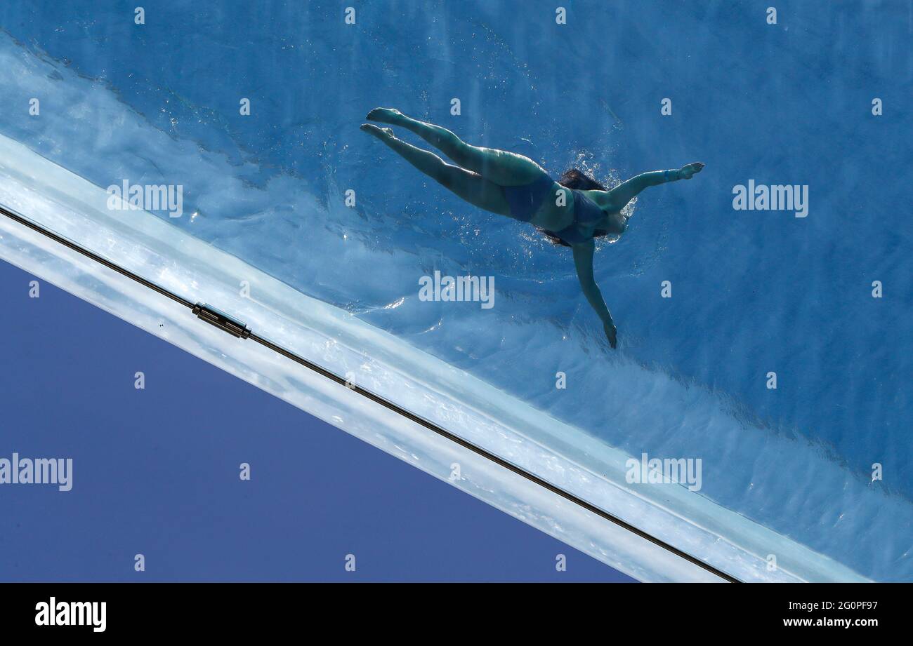 London, Britain. 2nd June, 2021. A person swims in the Sky Pool, a ...