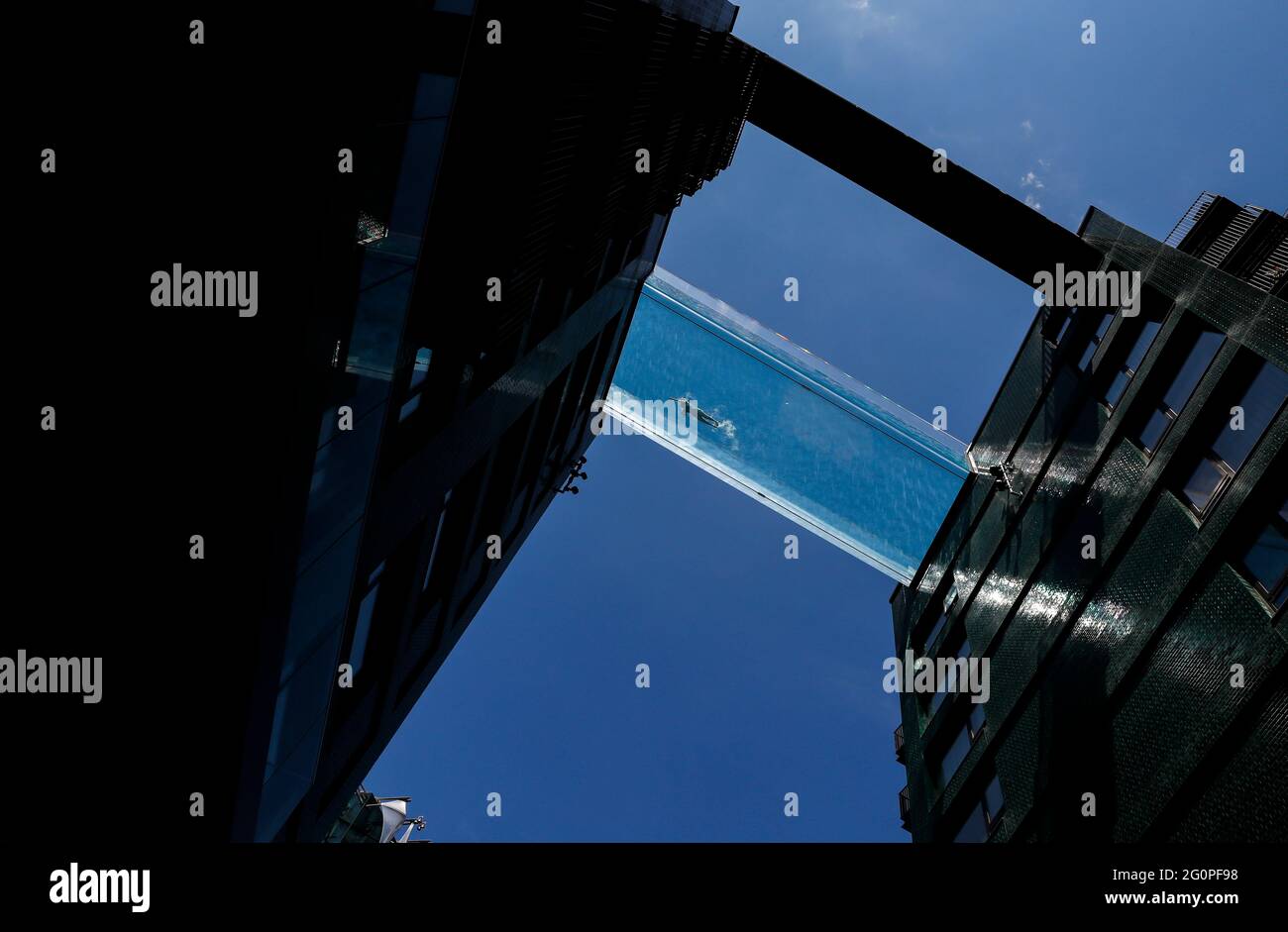 London, Britain. 2nd June, 2021. A person swims in the Sky Pool, a ...