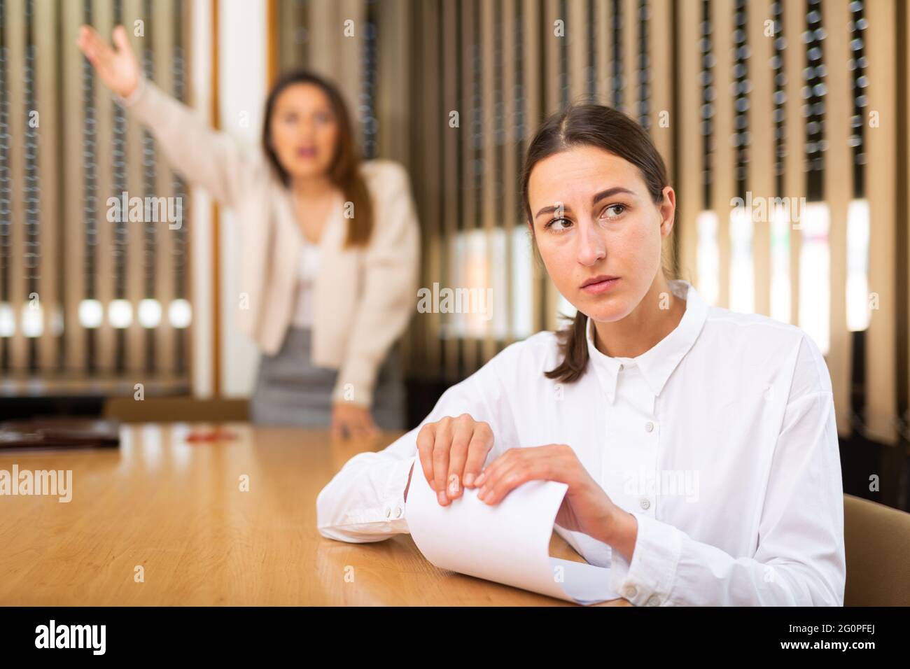 Portrait of frustrated woman holding dismissal letter Stock Photo - Alamy