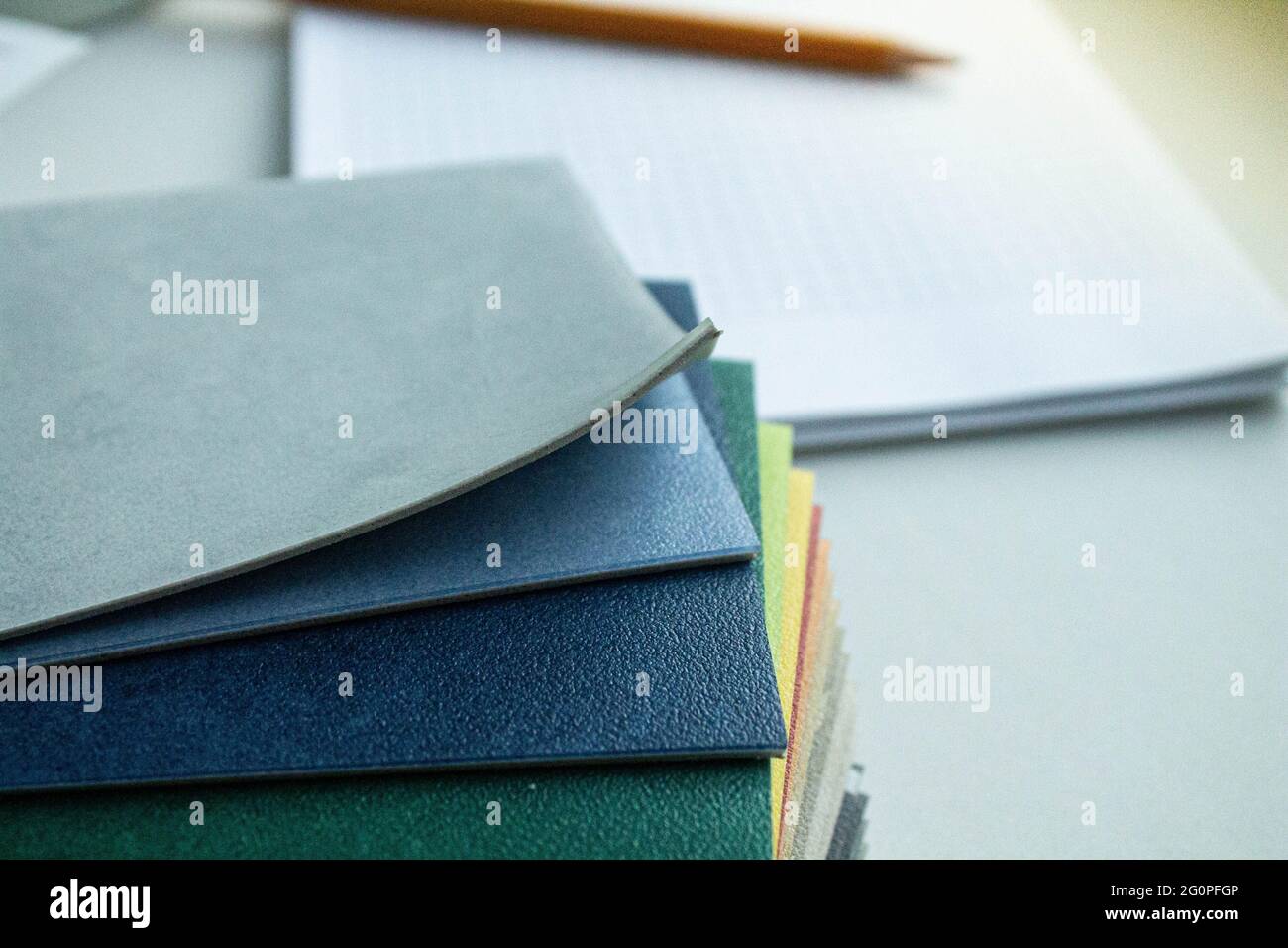 Choice of flooring. Samples of linoleum in different colors. Chopped ...