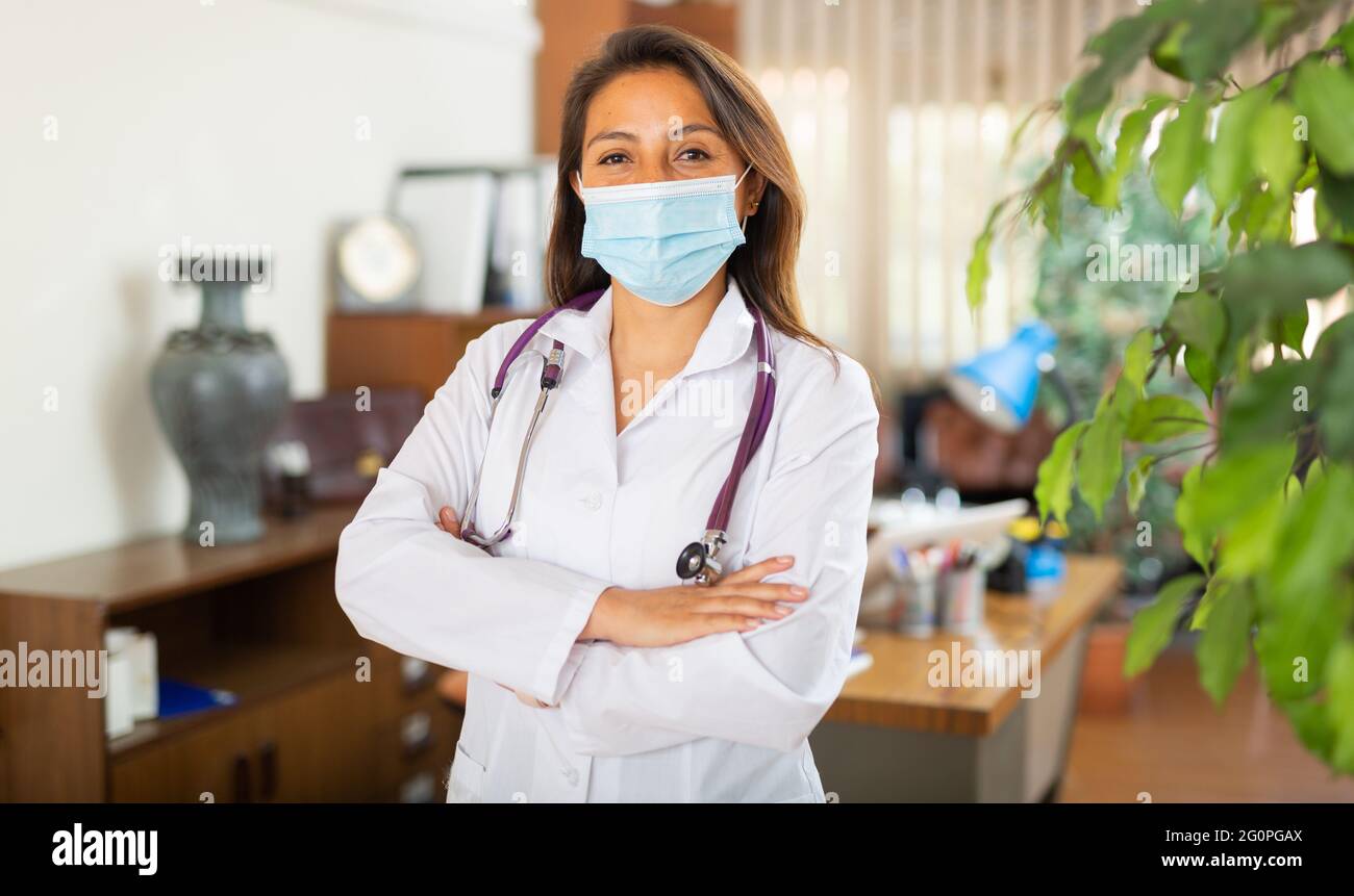 Female doctor in protective mask posing Stock Photo - Alamy