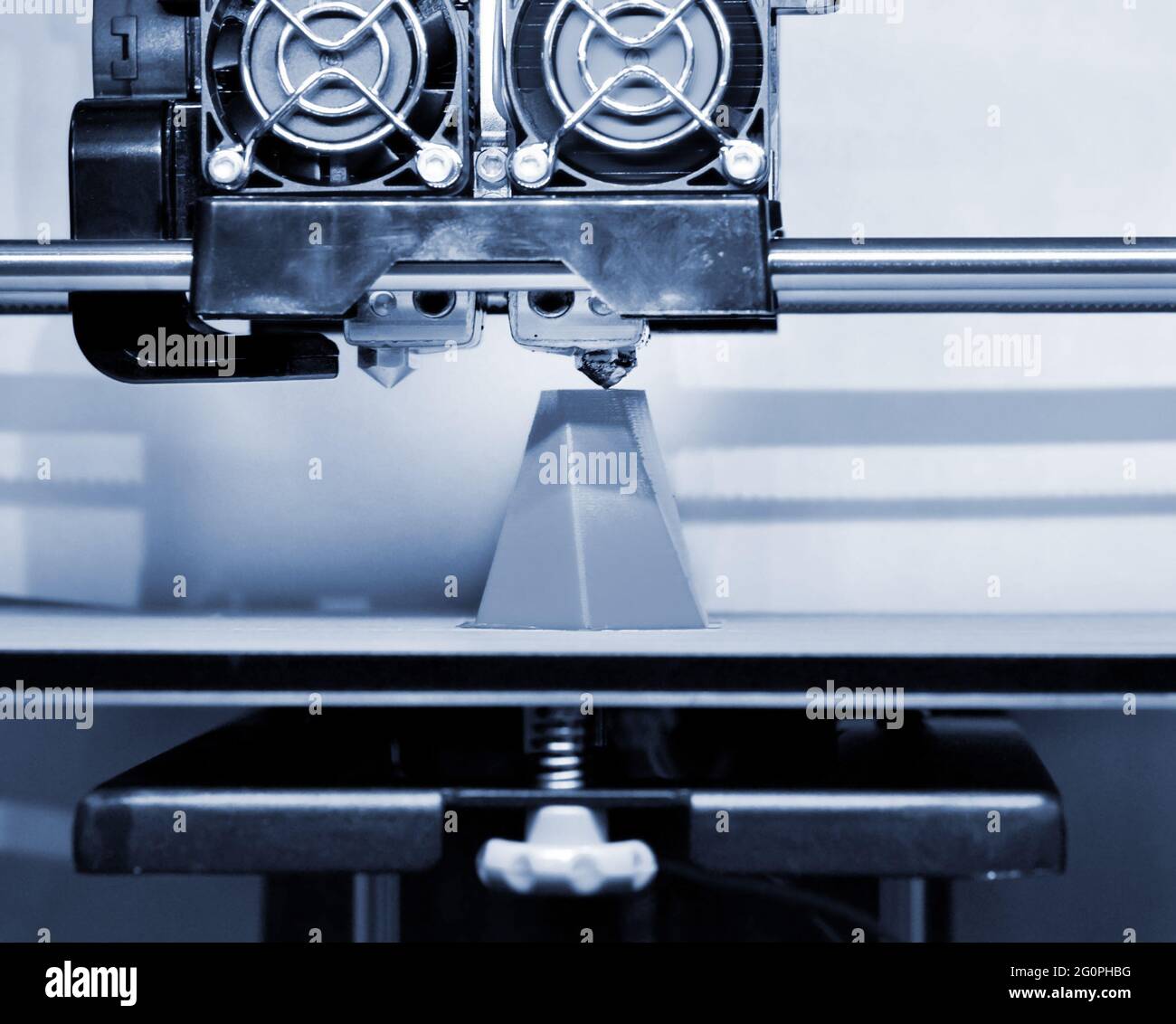 Modern 3D printer printing figure close-up. Automatic three dimensional ...