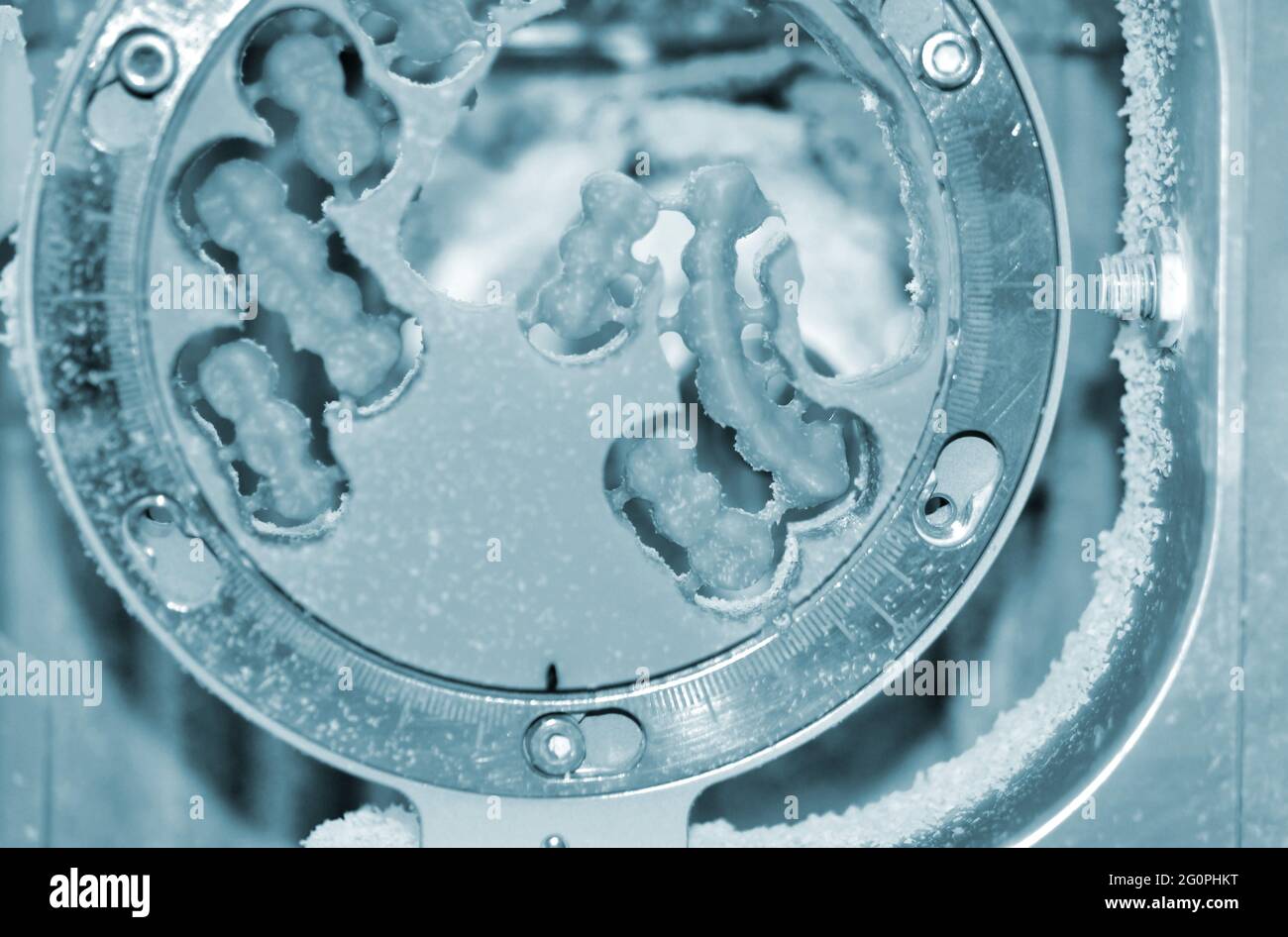 Dental milling machine carving out shape of human teeth Stock Photo - Alamy