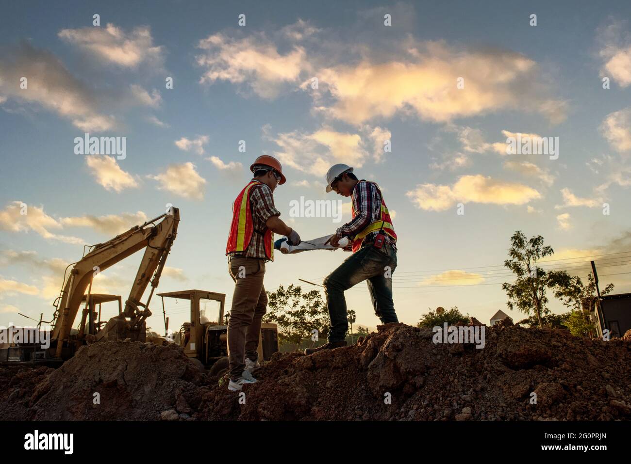 Engineers discussion with architects work planing in construction site ...