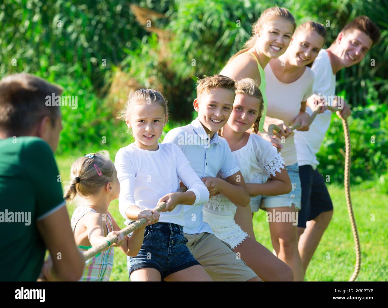kids with adults playing active games Stock Photo - Alamy