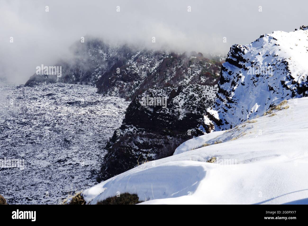 white snow and low clouds on landscape of "Salifizio" rocky ridge and ...