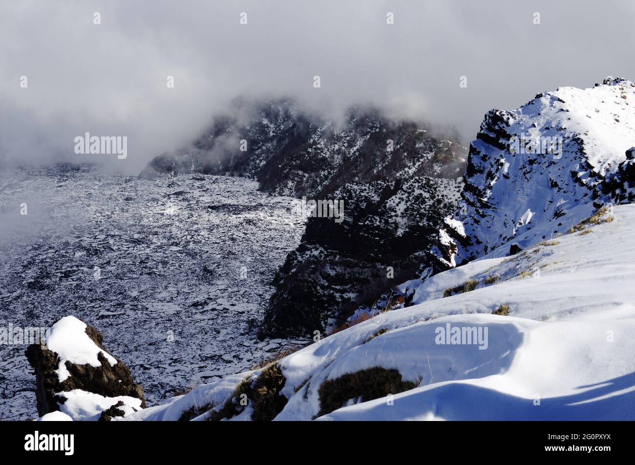 white snow and low clouds on landscape of "Salifizio" rocky ridge and ...