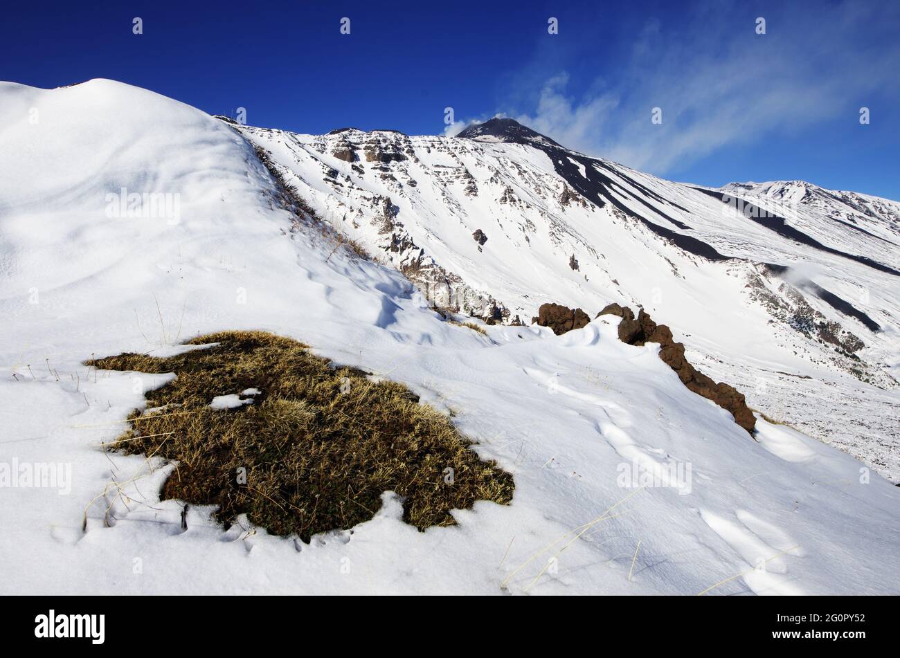 the steep mountain slope of "Bove" Valley covered of snow in Sicily ...