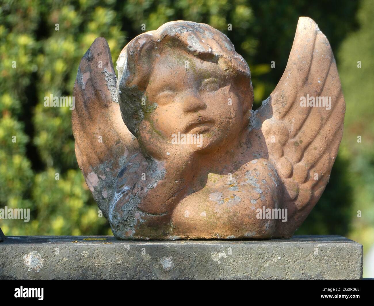 Innocent angel face. Made of stone Stock Photo - Alamy