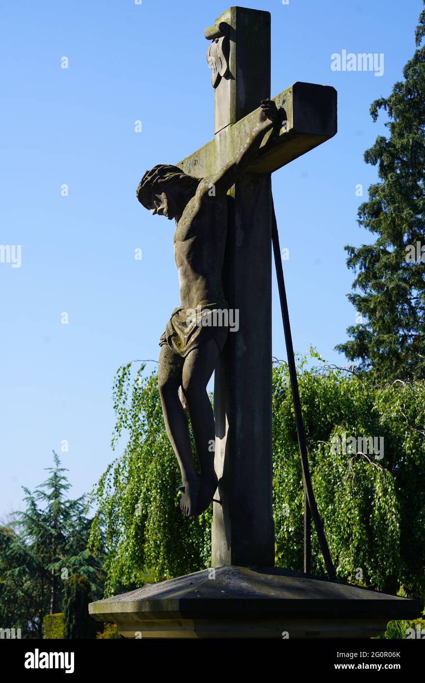 Jesus Christ on the Cross. Part of a grave on a cemetery. Crucifix ...