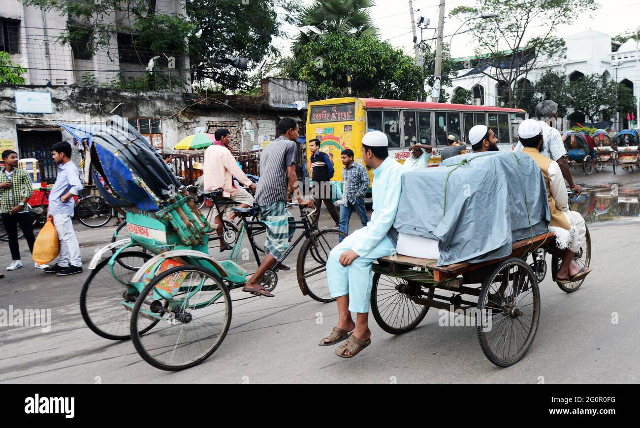 Colorful cycle rickshaws roaming the streets of Dhaka, Bangladesh Stock ...