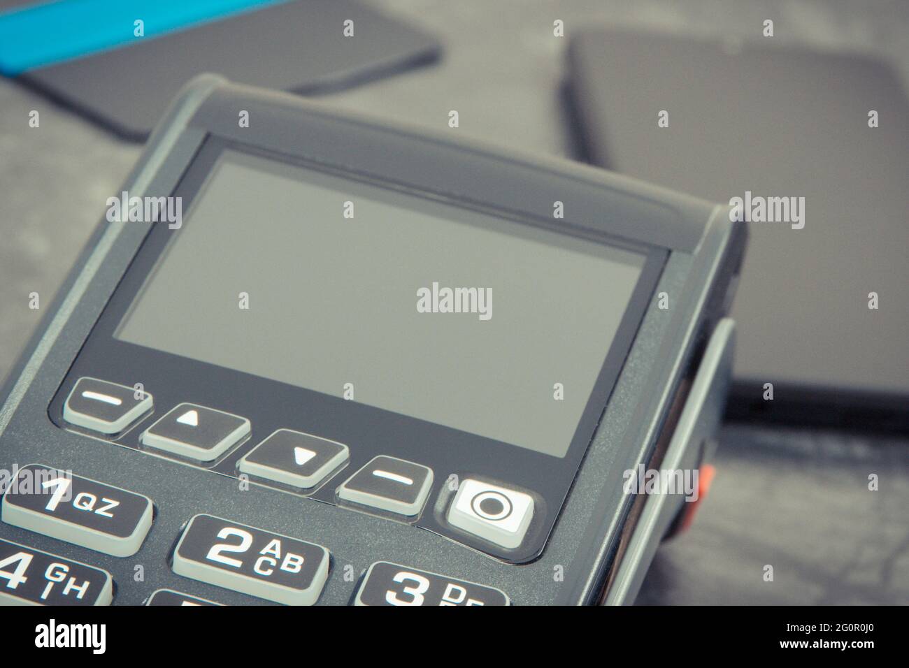 Payment terminal, credit card and smartphone. Cashless paying for ...