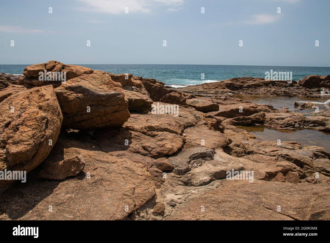 Rock pools at the beach with sea beyond Stock Photo - Alamy
