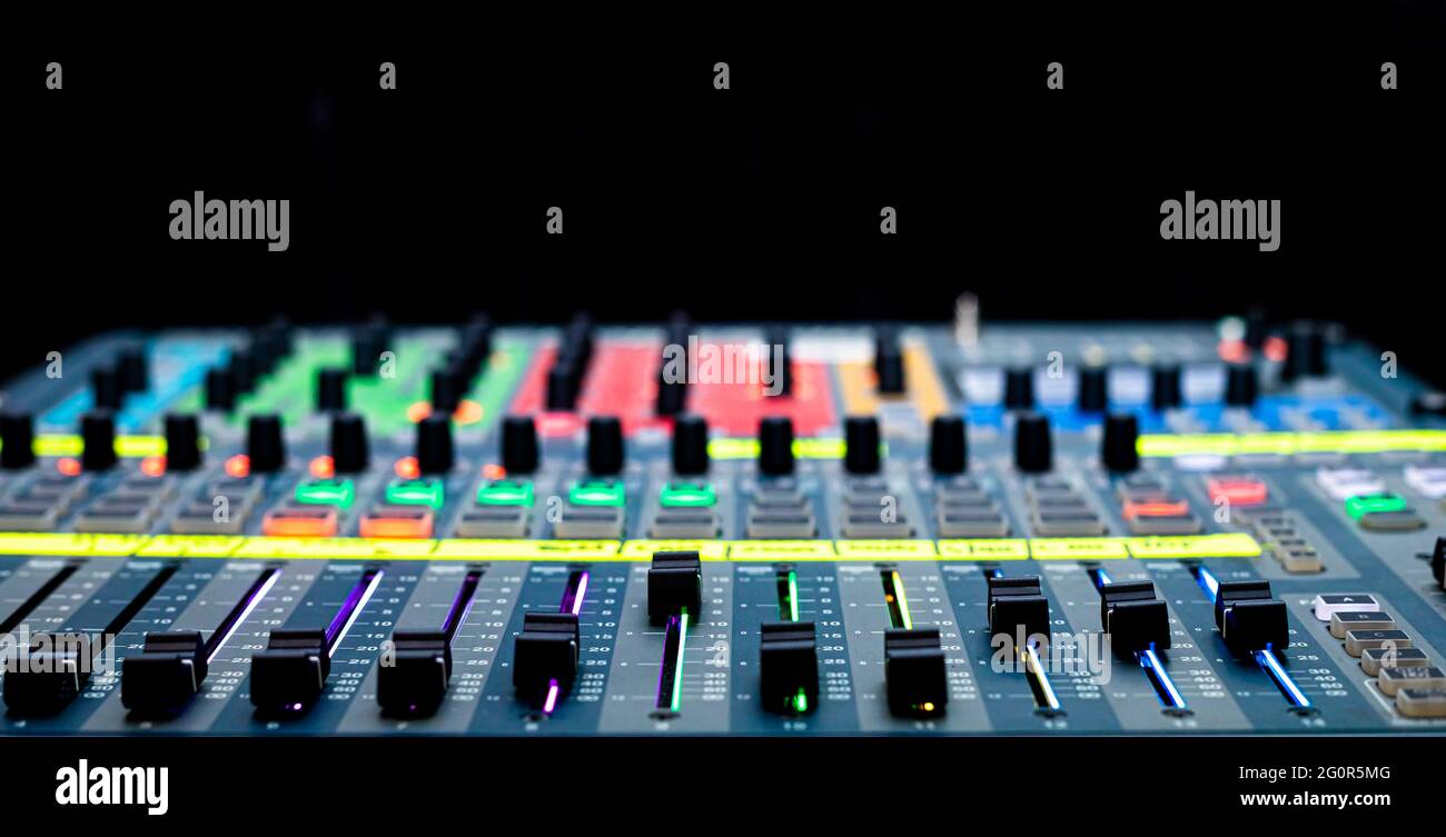 Close up of Sliders and buttons on Audio Mixing Desk at live event ...