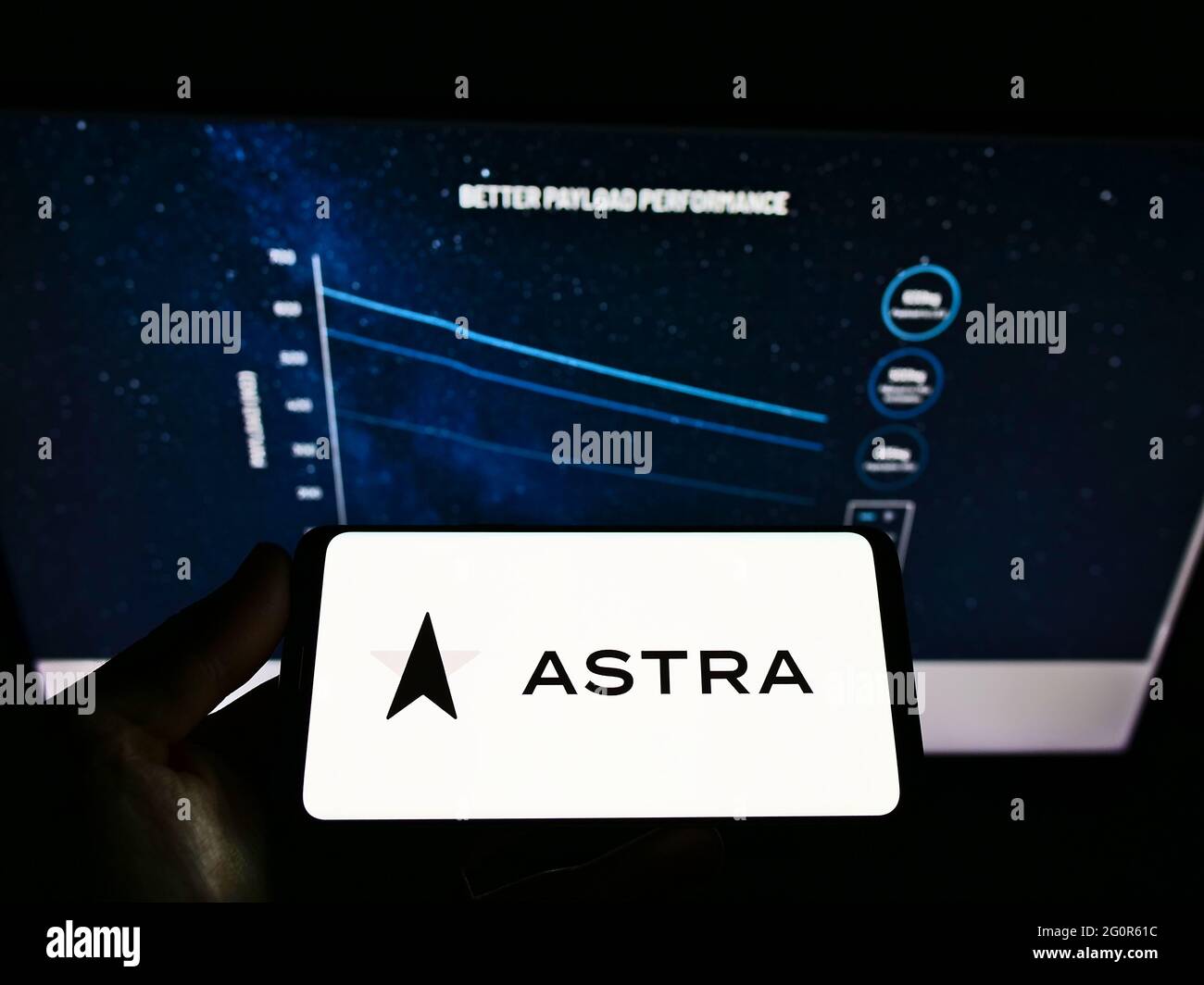 Person holding cellphone with logo of US aerospace company Astra Space ...