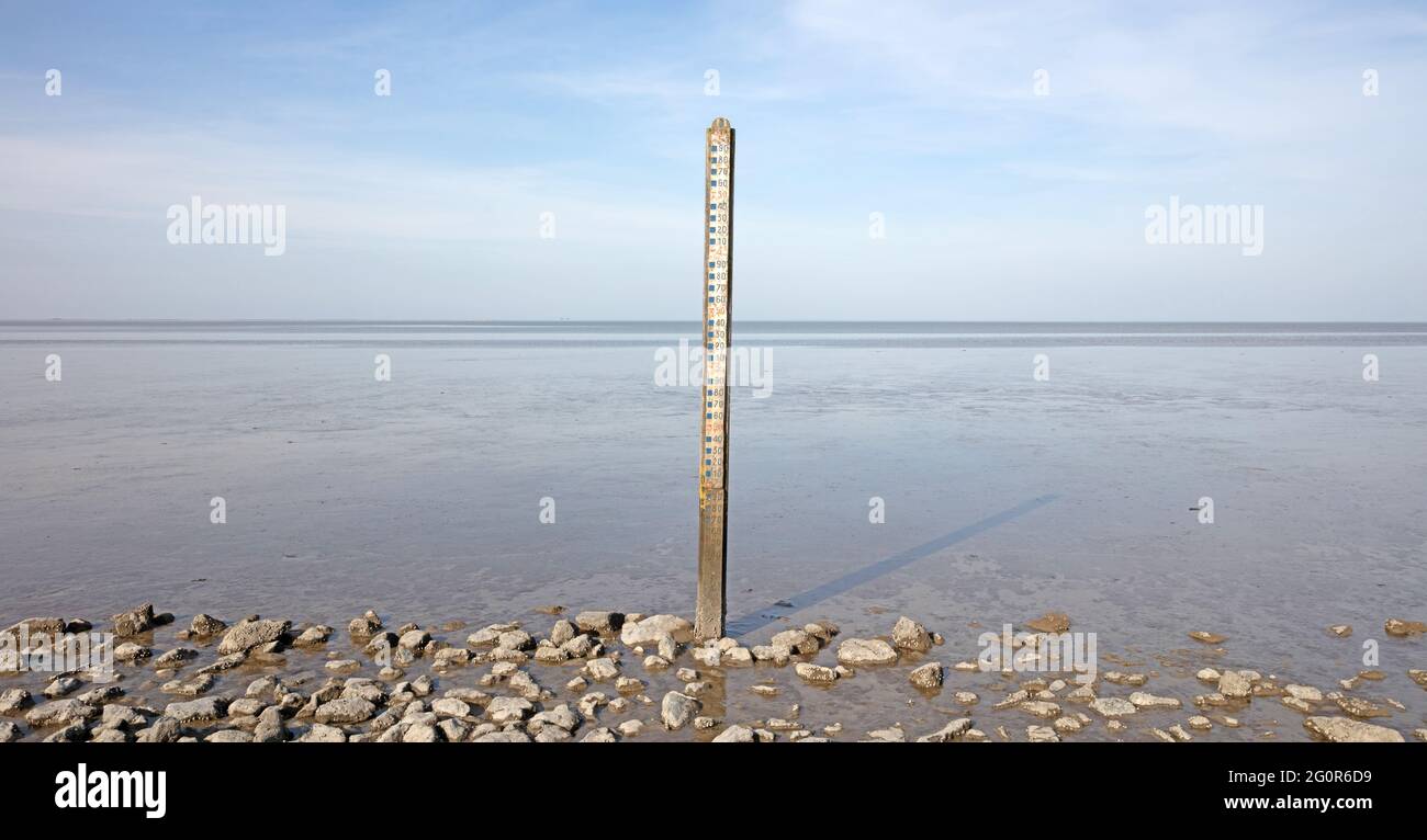 Old water level gauge in the Netherlands, Waddensea Stock Photo - Alamy