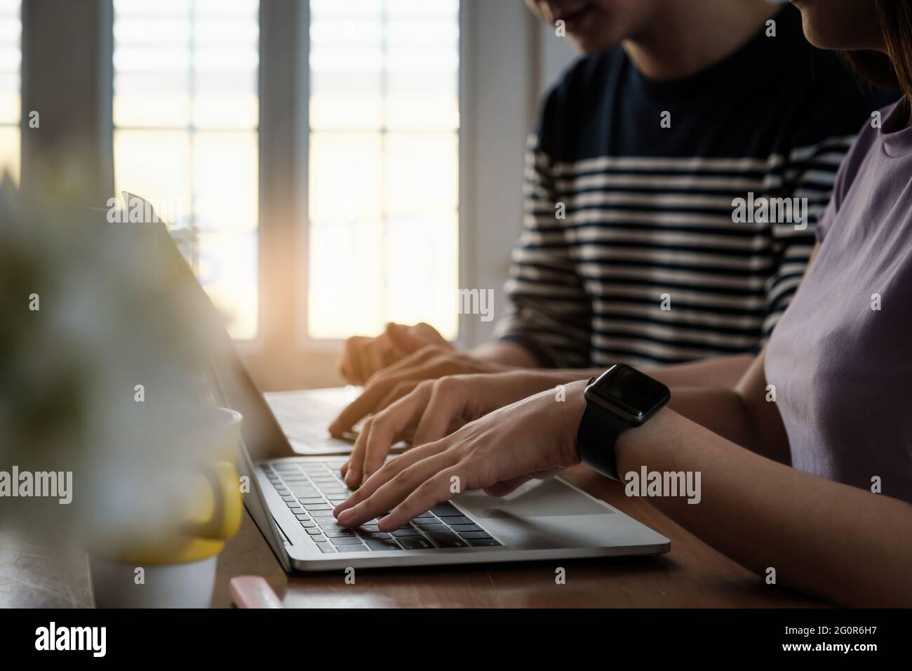 Asian student focus learning online course and watching video tutorial ...