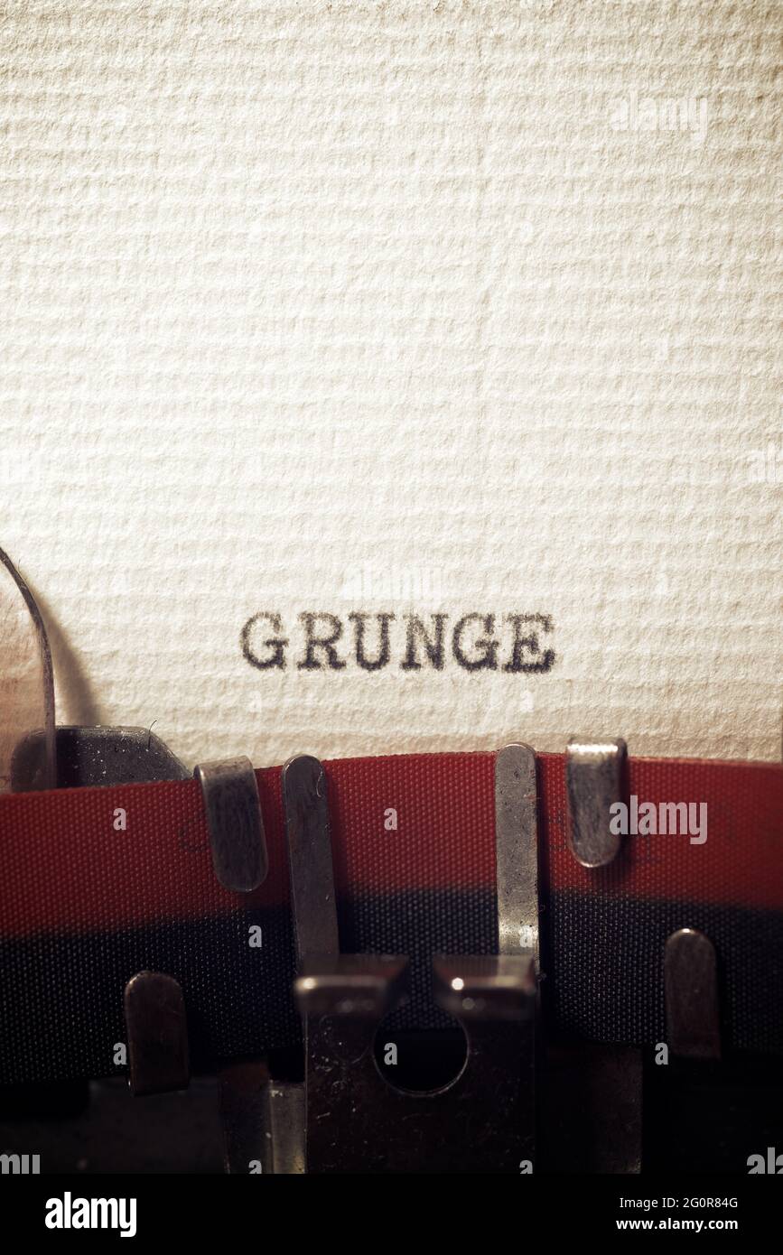The word grunge written with a typewriter Stock Photo - Alamy