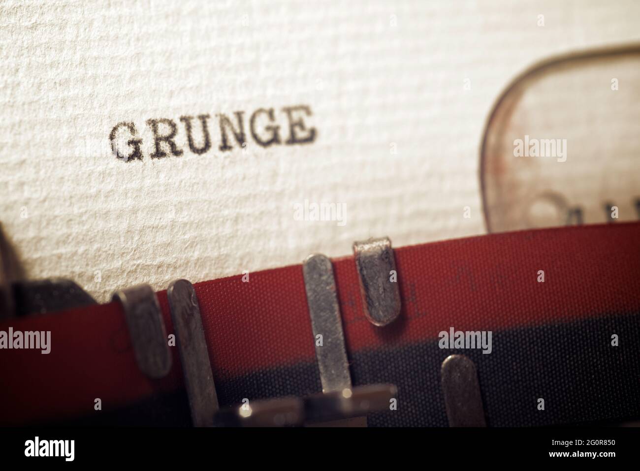 The word grunge written with a typewriter Stock Photo - Alamy