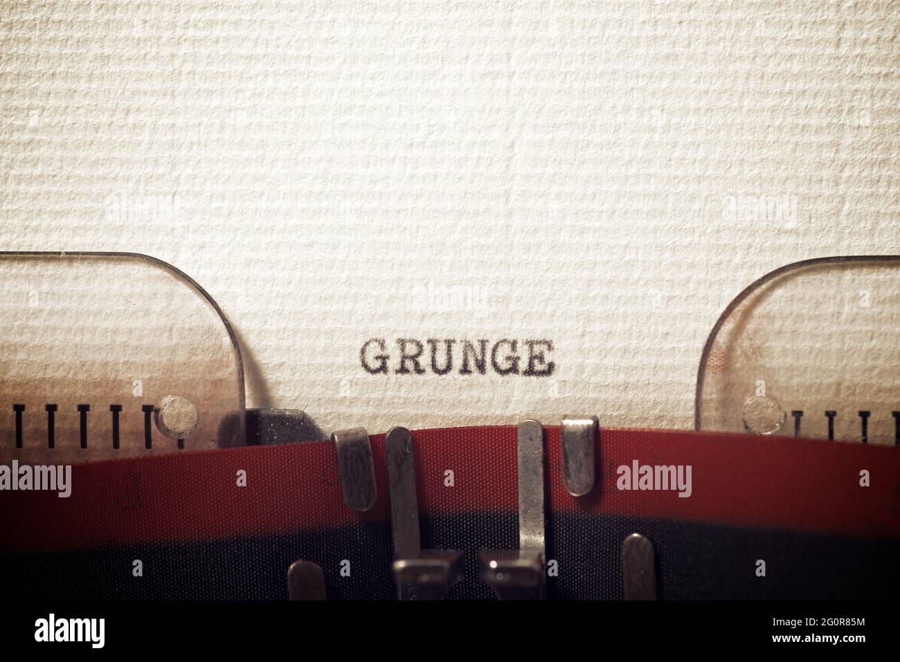 The word grunge written with a typewriter Stock Photo - Alamy