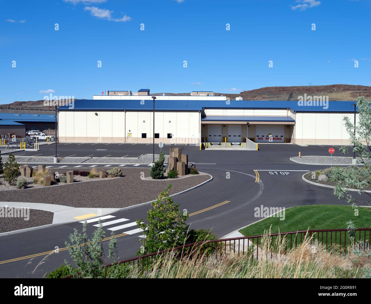 A Building with loading docks at an industrial complex Stock Photo - Alamy