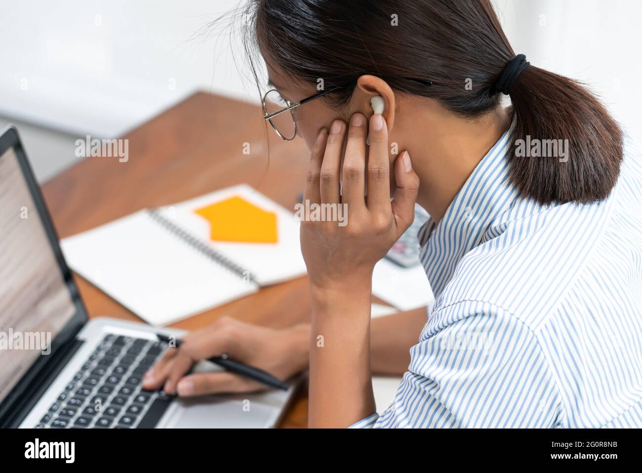 A stressed officer using thoughts focusing on the complicated task ...
