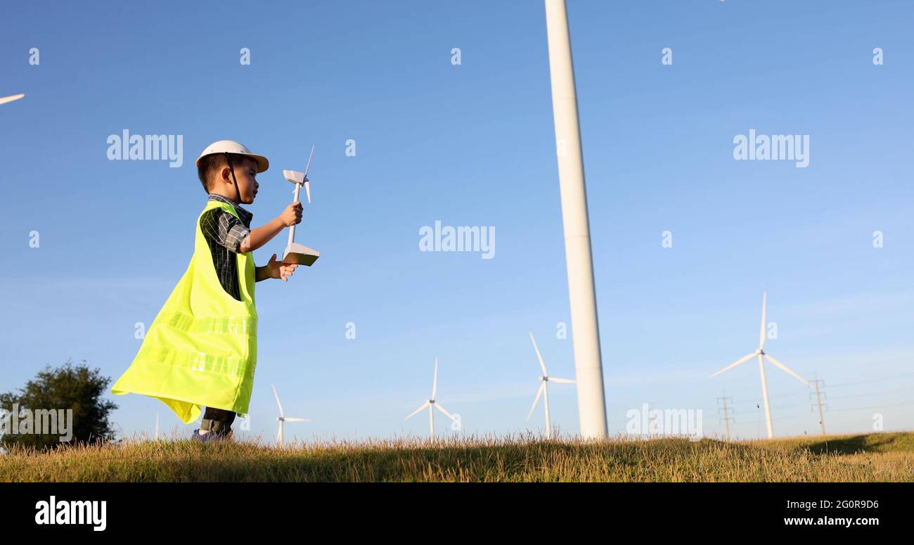 Asian little boy wants to be an engineer the wind turbines, Child's ...