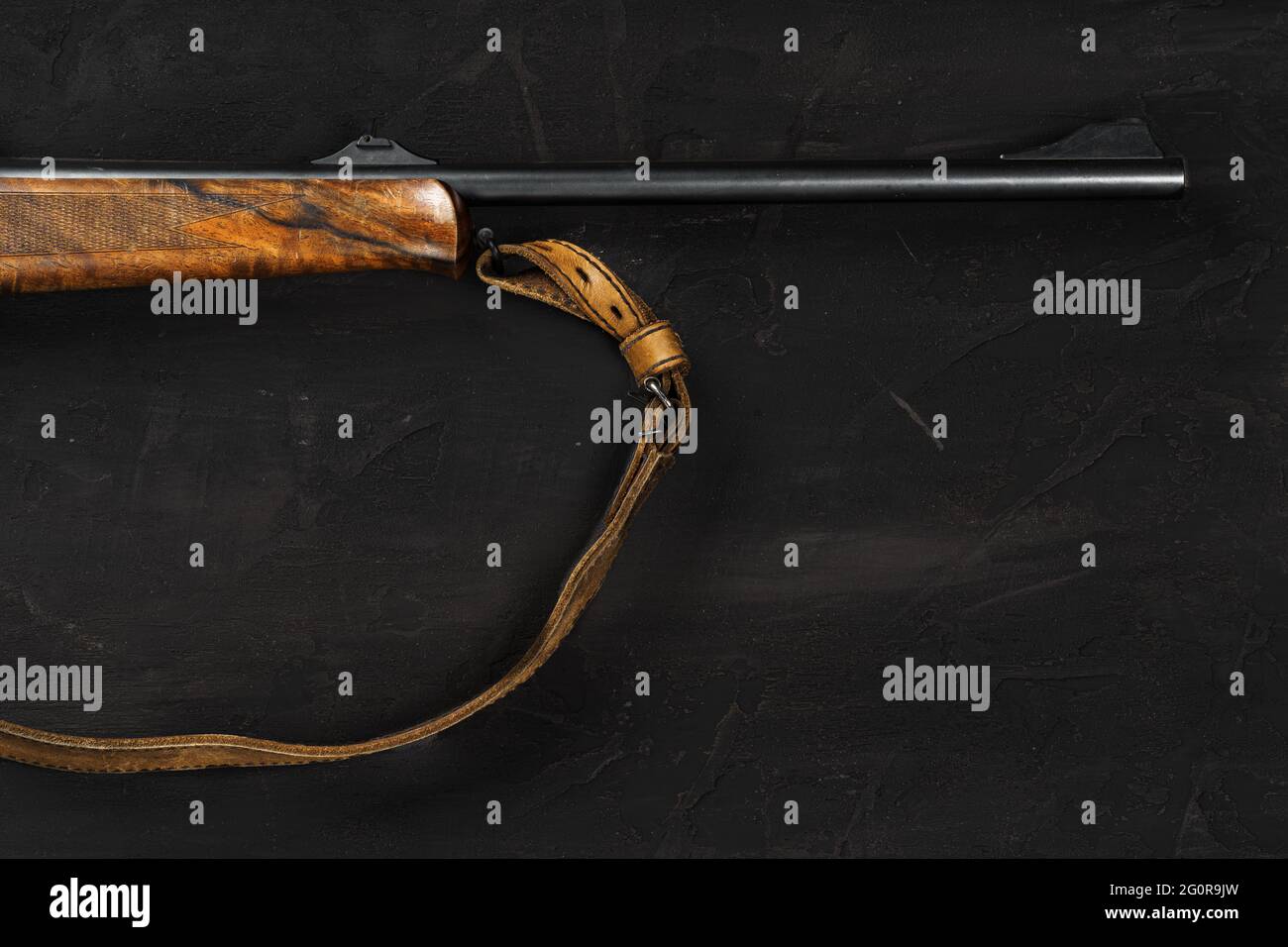 Smoothbore hunting gun on black background close up Stock Photo - Alamy