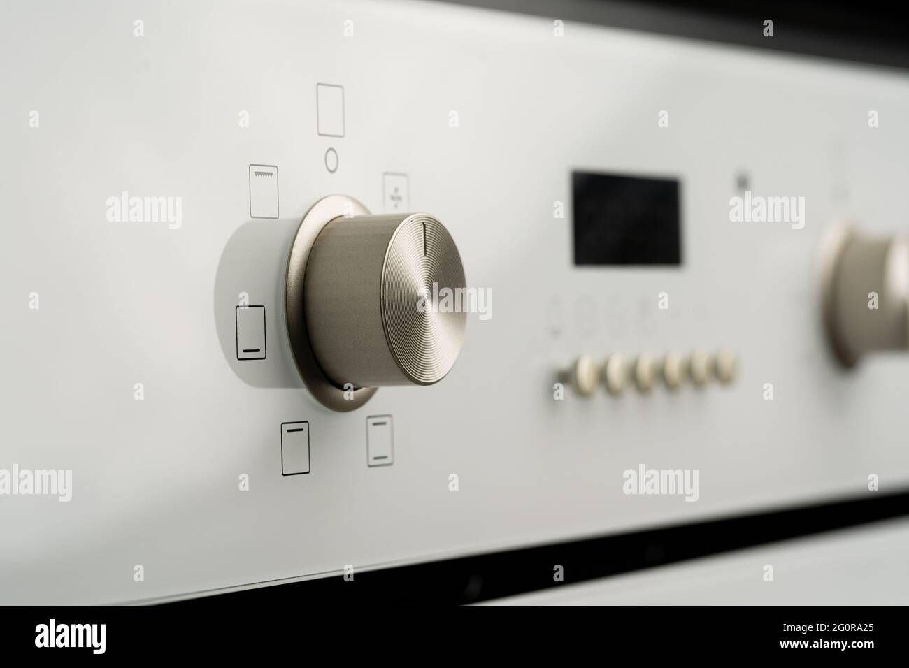 Modern oven mode control button close up Stock Photo - Alamy