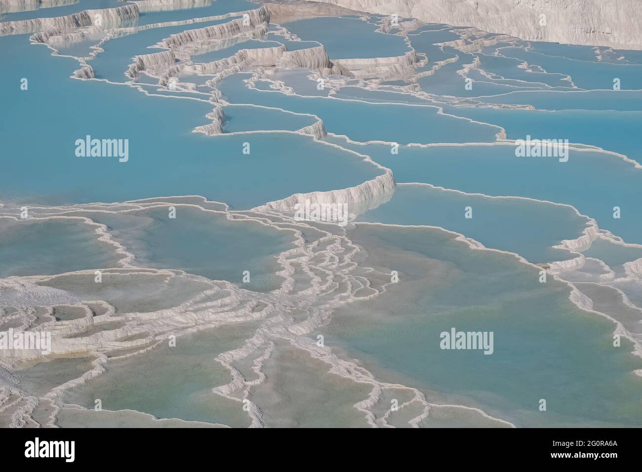 Beautiful natural travertine pools with blue water Stock Photo - Alamy