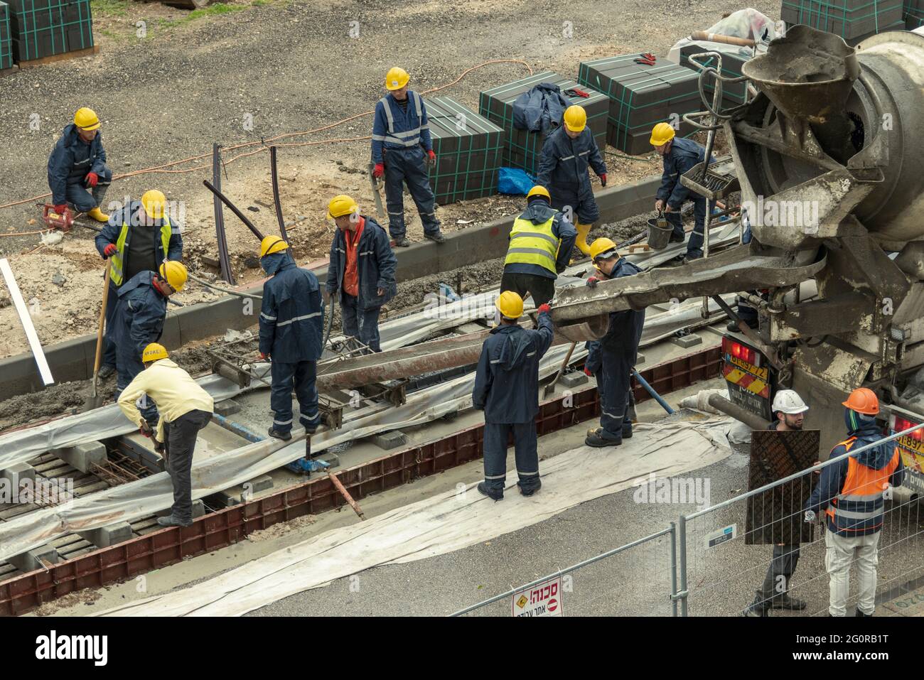 Tel Aviv, Israel - May 20 2021: Construction Workers working in the ...