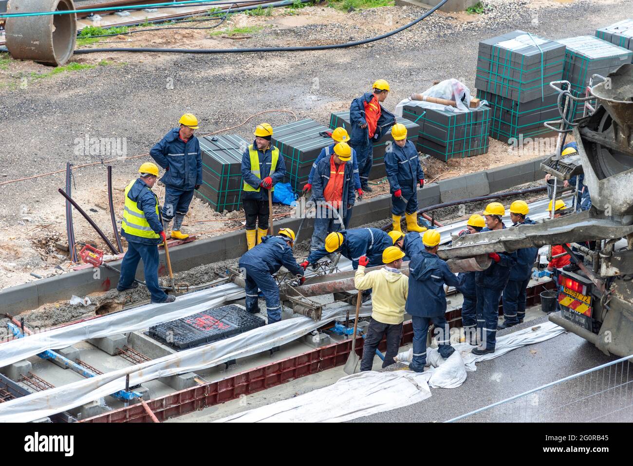 Tel Aviv, Israel - May 20 2021: Construction Workers working in the ...
