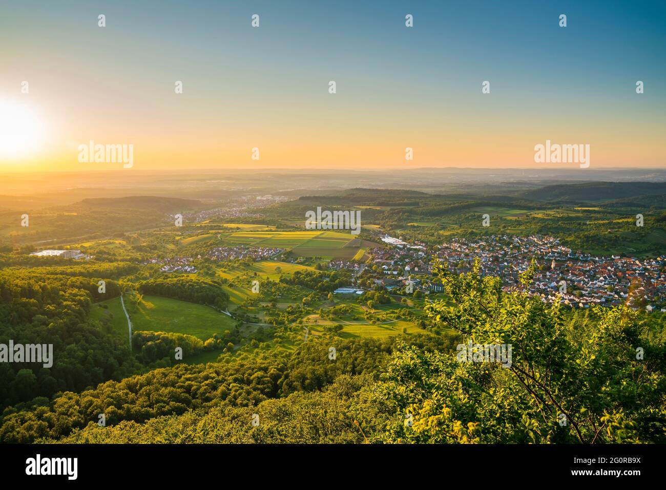 Germany, Beautiful green landscape of nature surrounding village houses ...