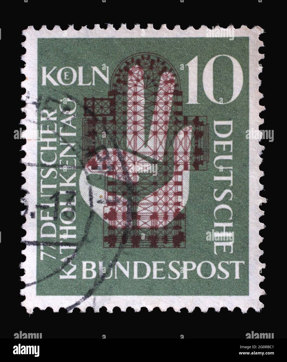 Stamp printed in Germany, shows a hand raised to the oath in front of ...