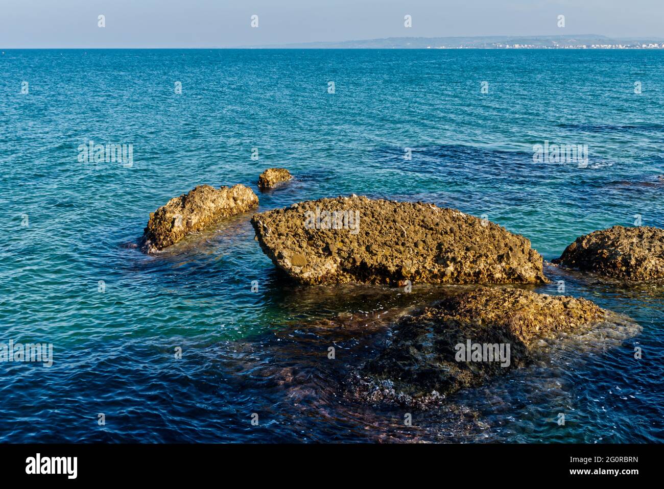 Beautiful view of the rocks and stones at the coastline and in the ...